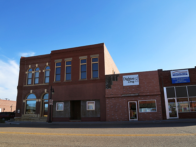 The sun casts a warm glow on Dighton's historic downtown, where the pharmacy still knows your name and your wallet doesn't leave crying.