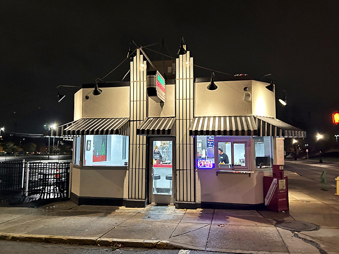 This little white building holds big burger secrets – thin patties with crispy edges that haunt your dreams for weeks.