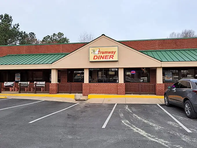 This unassuming spot serves pancakes the size of hubcaps – breakfast engineering at its finest.