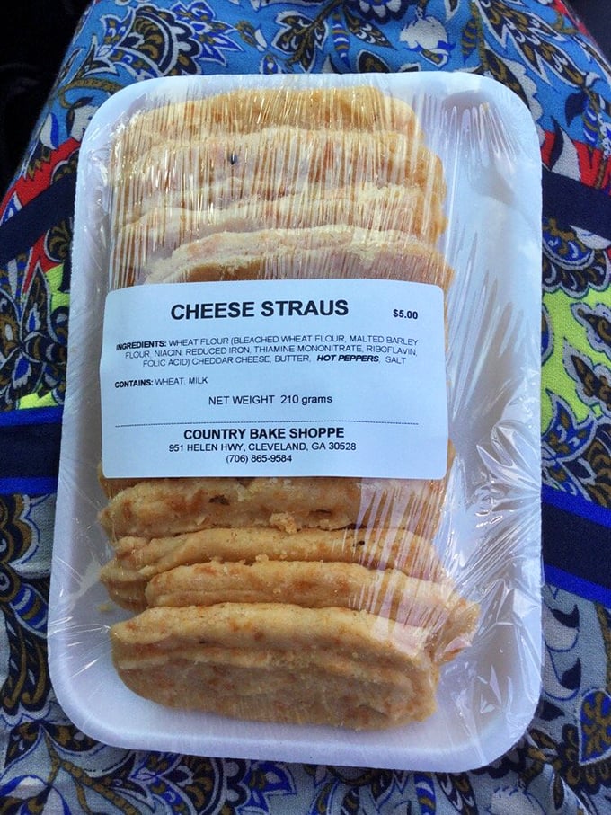 Cheese straus—the South's sophisticated answer to Cheetos. Flaky, sharp, with just enough kick to remind you they mean business.