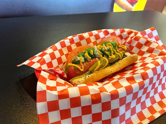 The Chicago dog in all its glory—a symphony of toppings that proves sometimes more is more. Notice what's missing? That's right, no ketchup!