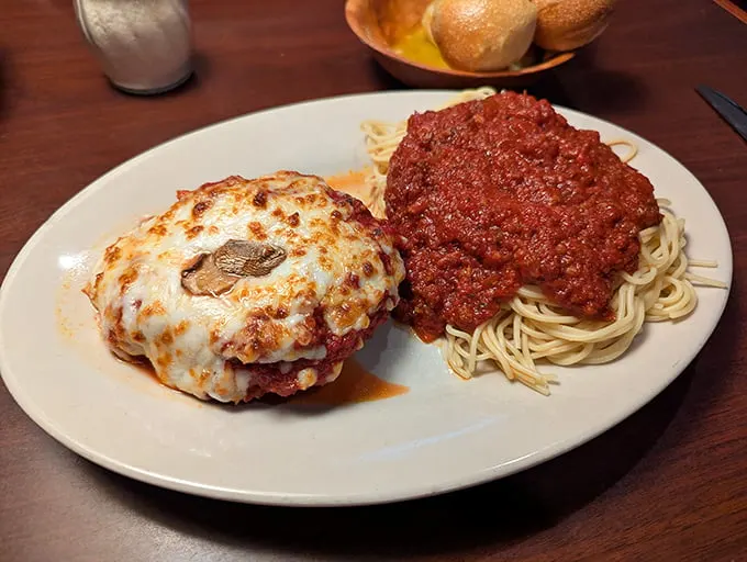 Italy's dynamic duo: Chicken parmesan and spaghetti teaming up like Batman and Robin to fight hunger crimes across Kennesaw.