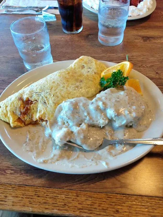 This chili omelet with biscuits and gravy isn't just breakfast—it's an edible hug that might require a post-meal nap. 