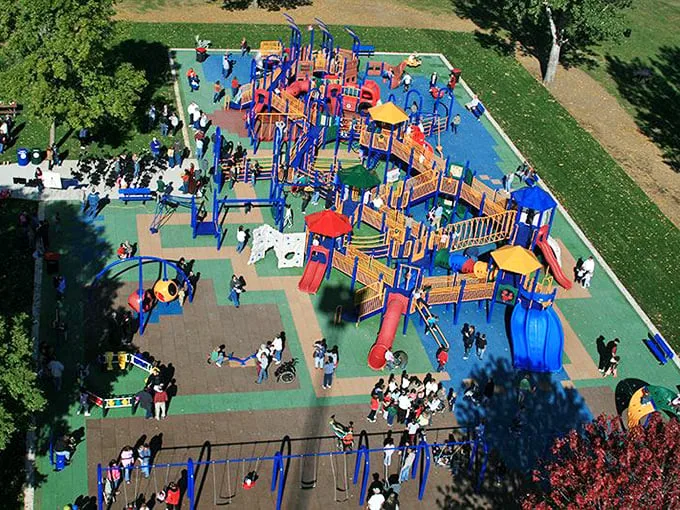 This playground isn't just for kids—it's where community happens, proving that sometimes the best attractions don't require an admission fee.
