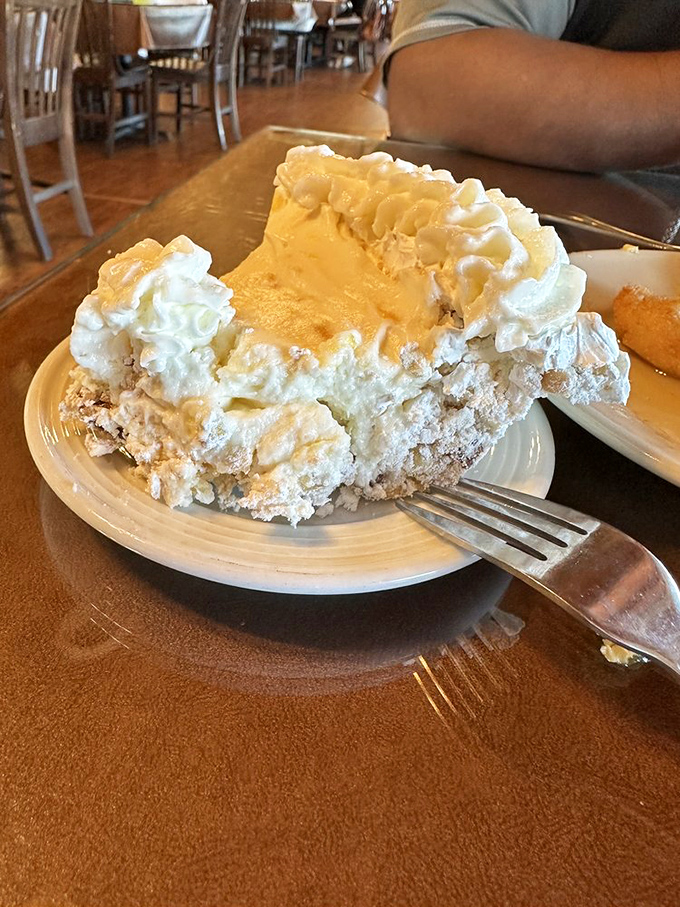 Company's Comin' Pie isn't just dessert, it's Arkansas' official state pie for good reason—a cloud-like meringue hiding treasures of cream and pineapple.