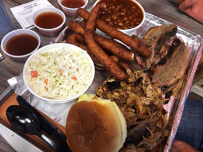 Barbecue nirvana on a tray: pulled pork, brisket, hush puppies, and those "banging" baked beans. Diet plans, consider yourselves postponed.