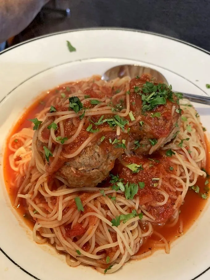 Spaghetti and meatballs—the dish that launched a thousand food comas. Those meatballs look like they've been practicing their tenderness for generations.