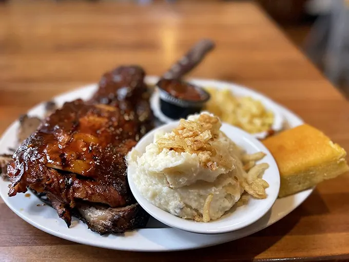 Fall-off-the-bone ribs paired with creamy sides—proof that sometimes the most meaningful relationships in life are between meat and potatoes.