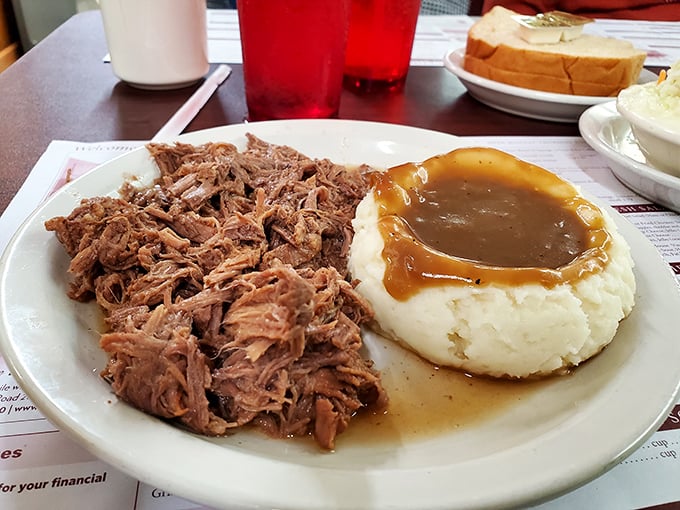 Behold the star of the show: roast beef that practically dissolves on contact. This isn't just meat and potatoes—it's edible poetry.