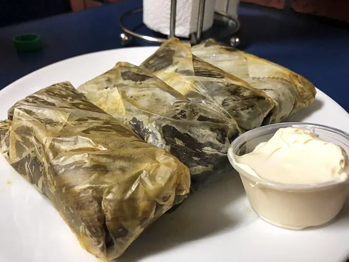 These tamales aren't just wrapped in corn husks – they're wrapped in tradition. One bite of these pillowy parcels and you'll understand why they're legendary.