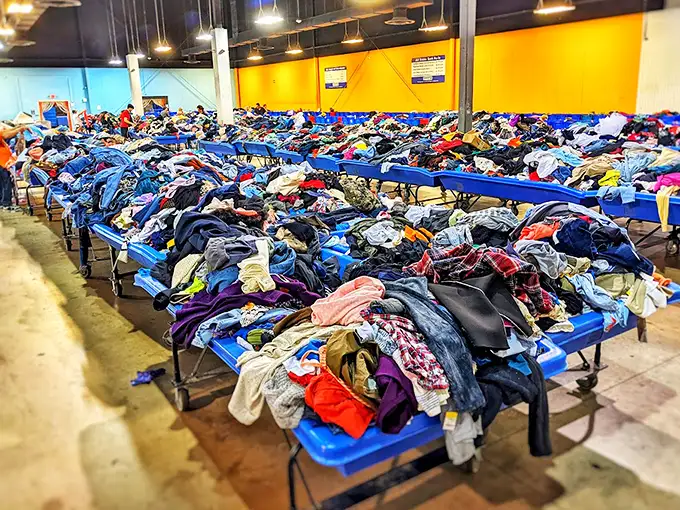 The clothing motherlode! Like a fabric rainbow organized by some delightfully chaotic deity who believes in second chances and sustainable fashion.
