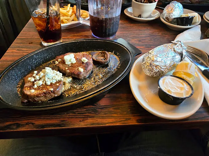 Steak nirvana achieved: perfectly seared medallions topped with blue cheese that melts into the meat like they were destined to meet.