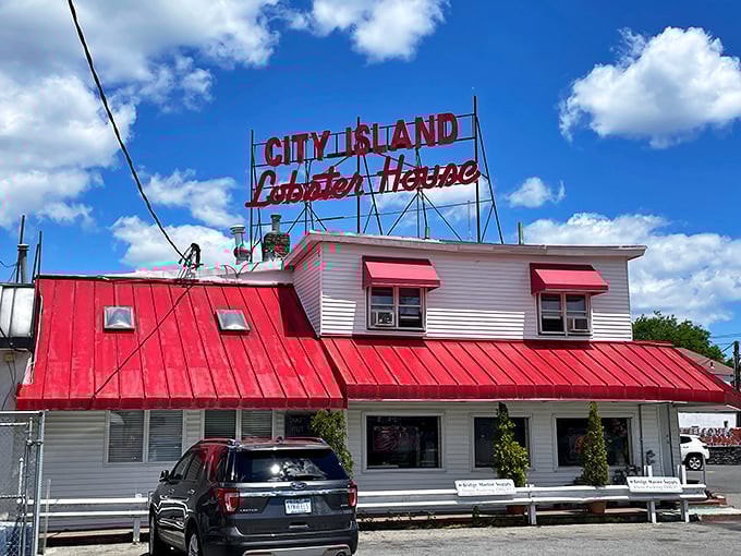Peter's Clam Bar welcomes you with classic red-and-white charm – like finding the seafood joint from your childhood vacation memories.
