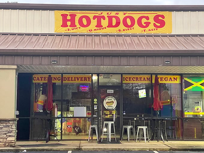 Just Dogs' bright yellow banner cuts through the clutter—a siren call for hot dog lovers who appreciate that sometimes, one thing done perfectly is enough.