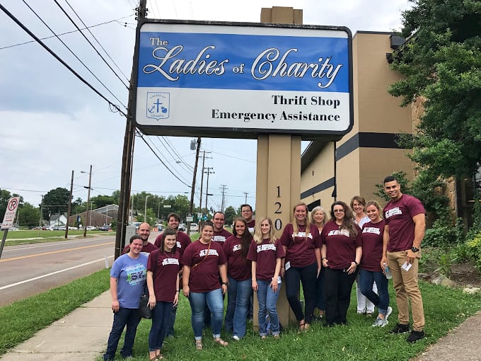 The Ladies of Charity sign stands tall, promising good deals with an even better purpose—shopping that feeds the soul.