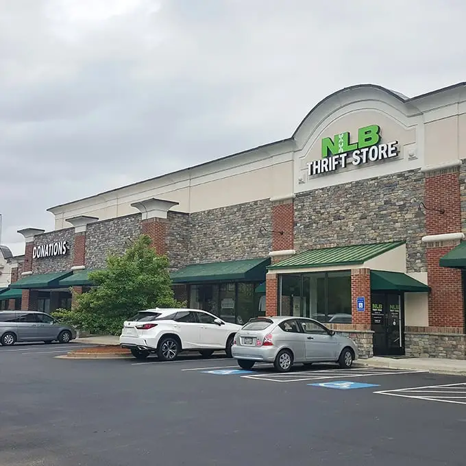 No Longer Bound's elegant stone facade breaks the thrift store stereotype – secondhand shopping with first-class ambiance.