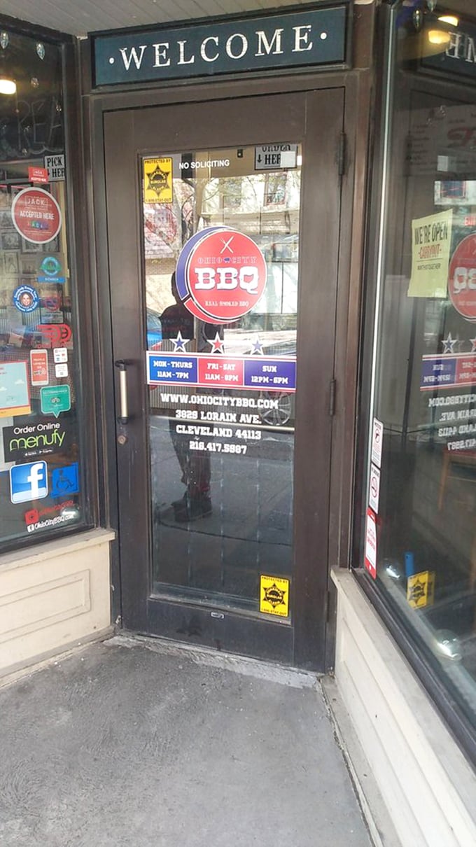 Real Smoq'ed BBQ's entrance promises authentic flavors behind that glass door. No fancy frills, just a portal to pork paradise.