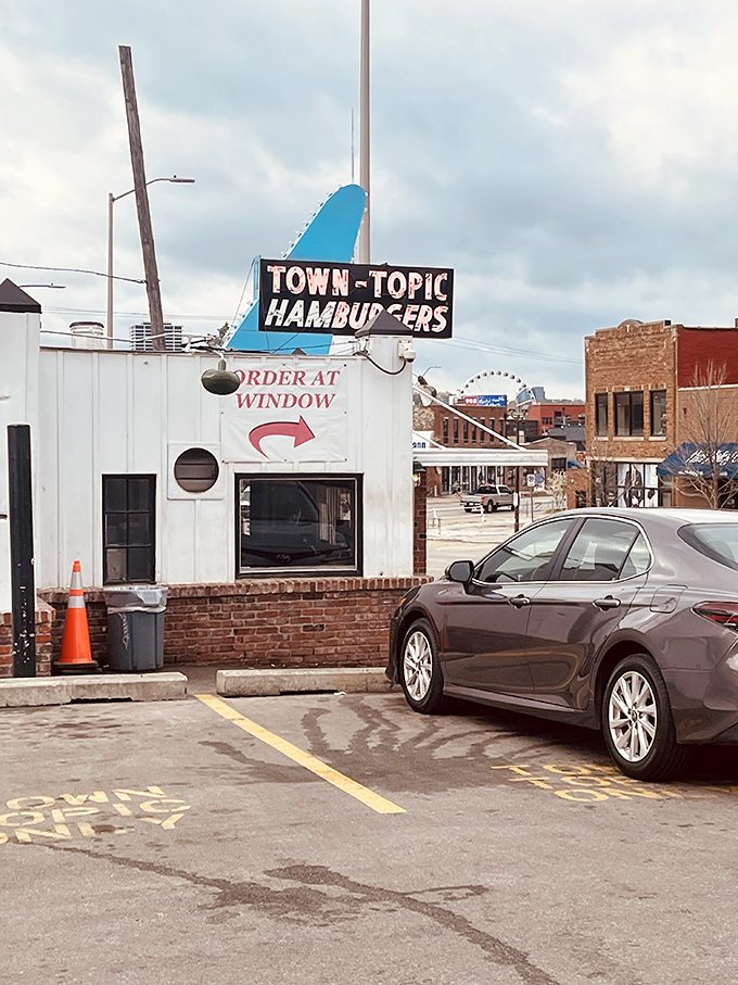Town Topic's "Order at Window" sign might be the most honest food advertising in America – no gimmicks, just burger perfection.