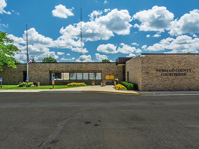 White Cloud's courthouse stands as a no-nonsense testament to small-town practicality – where your retirement dollars go further than your GPS signal.