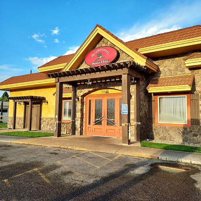 The warm yellow stucco of Abracadabra's glows like the perfect egg yolk in morning sunlight. A breakfast oasis amid Idaho Falls' urban landscape.
