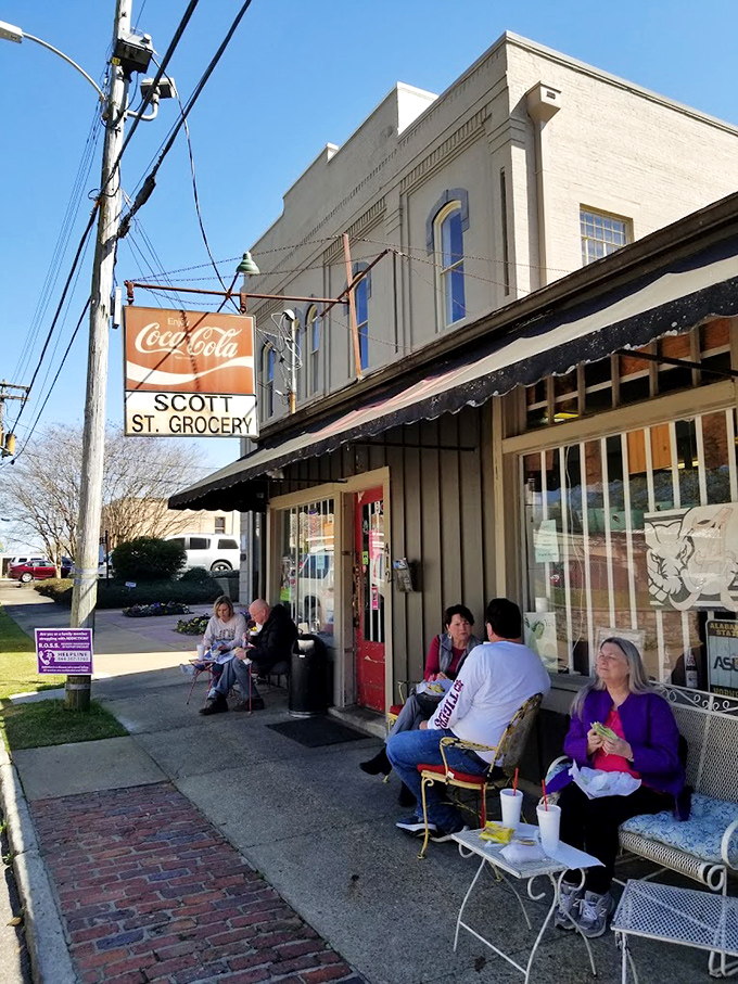 Vintage Coca-Cola signs and community conversations – Scott Street Deli serves up nostalgia between two slices of bread.