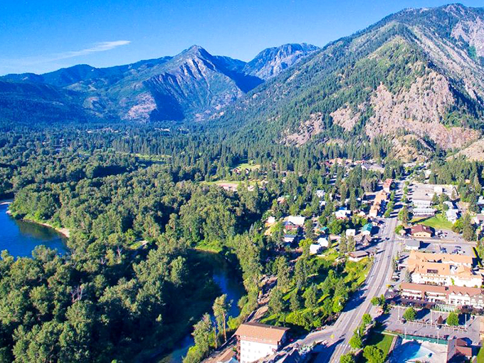 From above, Leavenworth reveals its perfect positioning—nestled between mountains and river, like nature designed a pocket specifically for this Alpine village.