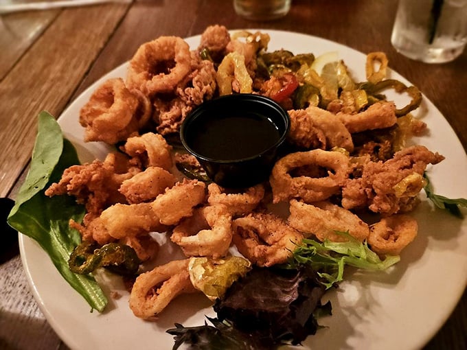 Crispy calamari that puts most seafood restaurants to shame. Tender, perfectly fried, and enough to share—though you might not want to.