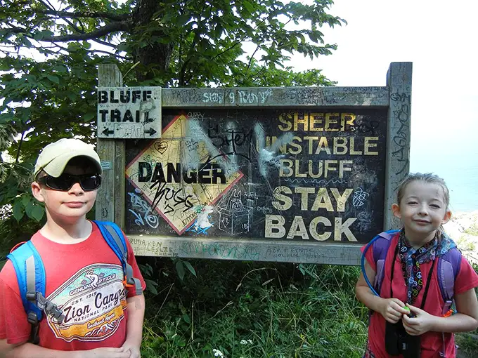 Warning signs covered in graffiti – where danger and teenage artistic expression meet in that special way that makes parents' hair turn gray.