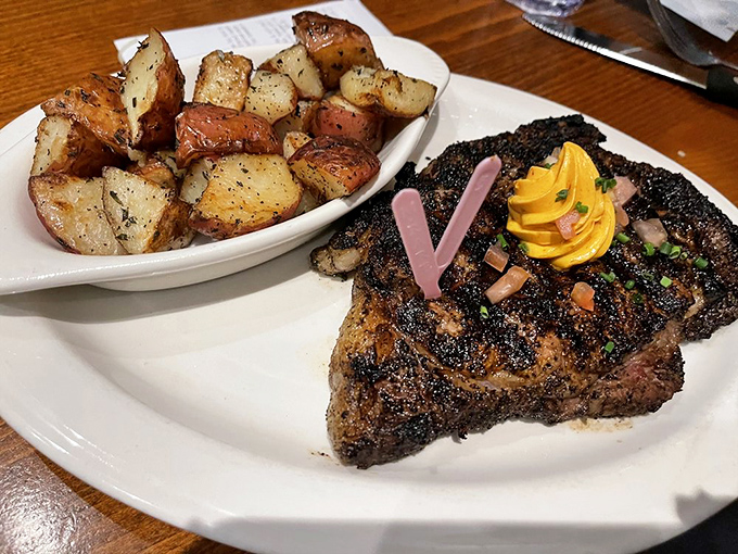 Coffee-rubbed ribeye with roasted potatoes—proof that sometimes the simplest combinations create the most profound experiences.