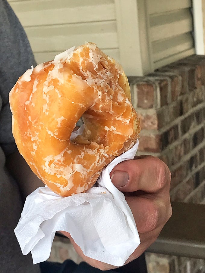 Evidence of donut perfection: that telltale crackling of glaze against soft dough. Some people drive hundreds of miles for this moment of simple bliss.