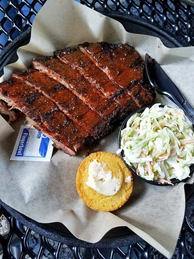 These ribs aren't just falling off the bone—they're practically jumping into your mouth. The coleslaw provides the perfect cool counterpoint to smoky perfection.