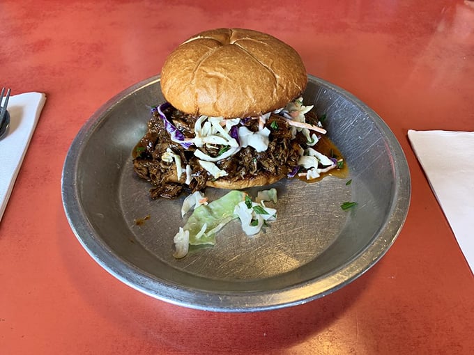 The Ripley sandwich proves there's no alien to flavor combinations—pulled chicken in blueberry molasses topped with slaw creates a sweet-savory battle worth experiencing.