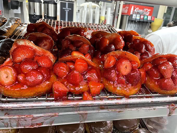 Not just donuts, but edible art—these strawberry-stuffed masterpieces look like they're auditioning for the Louvre of breakfast pastries.