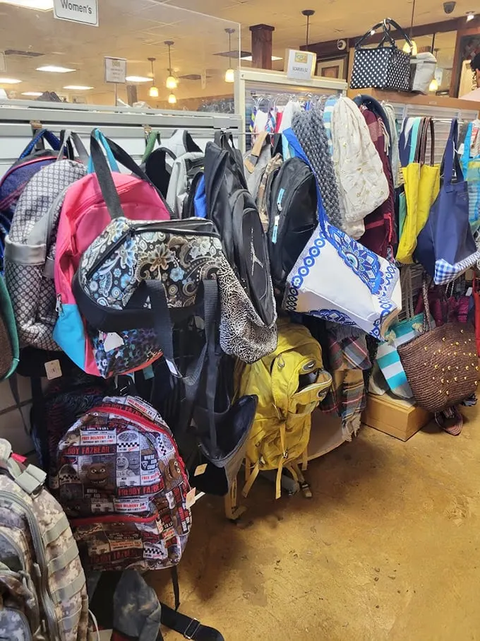 Bag heaven! From designer-inspired totes to quirky backpacks, this hanging garden of accessories proves one person's castoff is another's fashion statement.