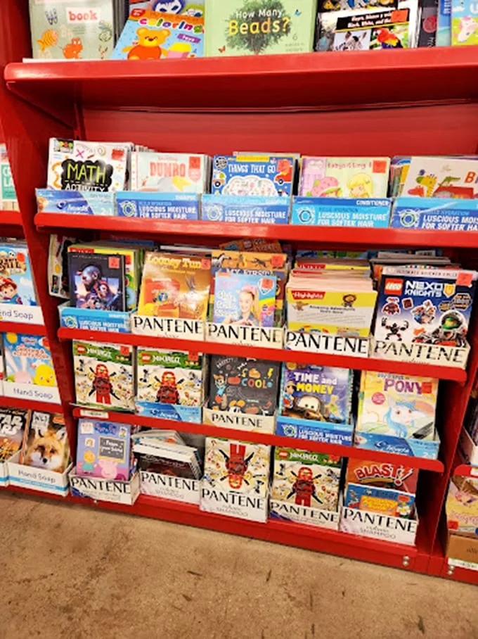 Children's books galore! Somehow Pantene shampoo snuck into this literary playground – just one of Ollie's delightful retail plot twists.