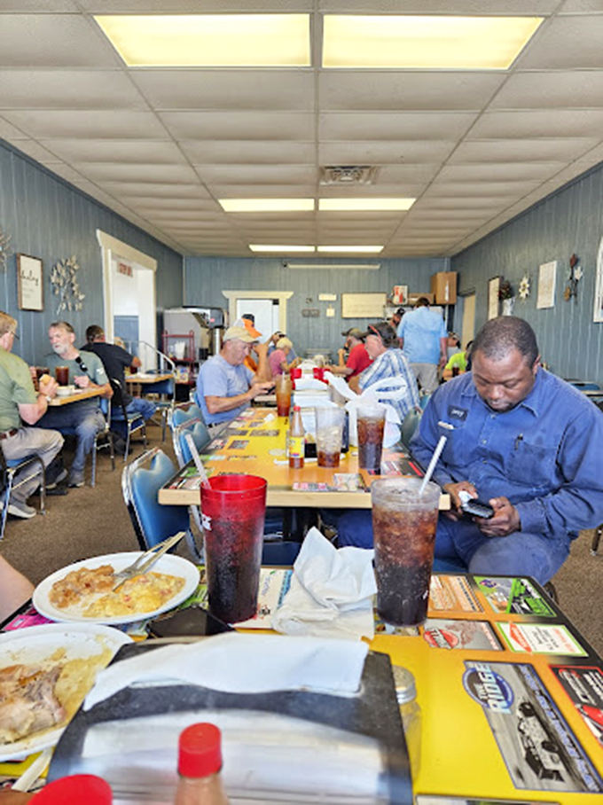 Sweet tea in those iconic red plastic tumblers – the unofficial state beverage of Arkansas gatherings and the perfect companion to a plate piled high.