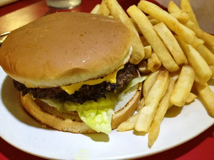 This isn't just a cheeseburger and fries—it's edible nostalgia, when beef was beef and calories weren't yet invented.
