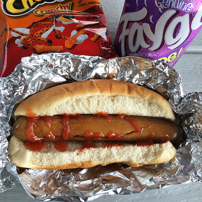 Sometimes simplicity speaks volumes. This classic dog with ketchup and mustard is the culinary equivalent of a favorite old song—familiar, comforting, and always satisfying.