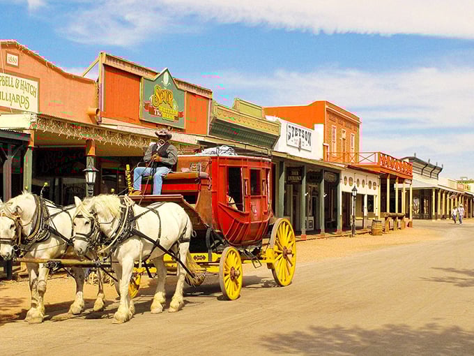 A stagecoach rolls through Tombstone, offering modern visitors a glimpse into transportation methods that didn't include USB charging ports.