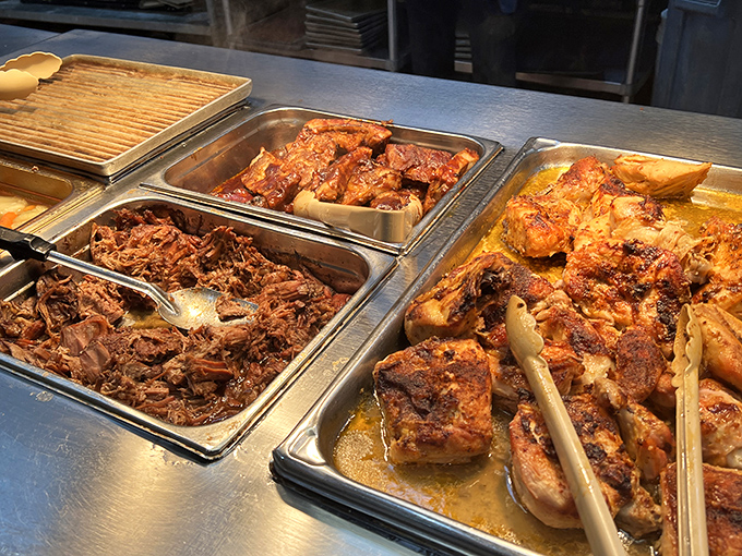 A trio of slow-cooked meats glistening with promise. This isn't just food—it's a commitment to the art of patience and proper seasoning.