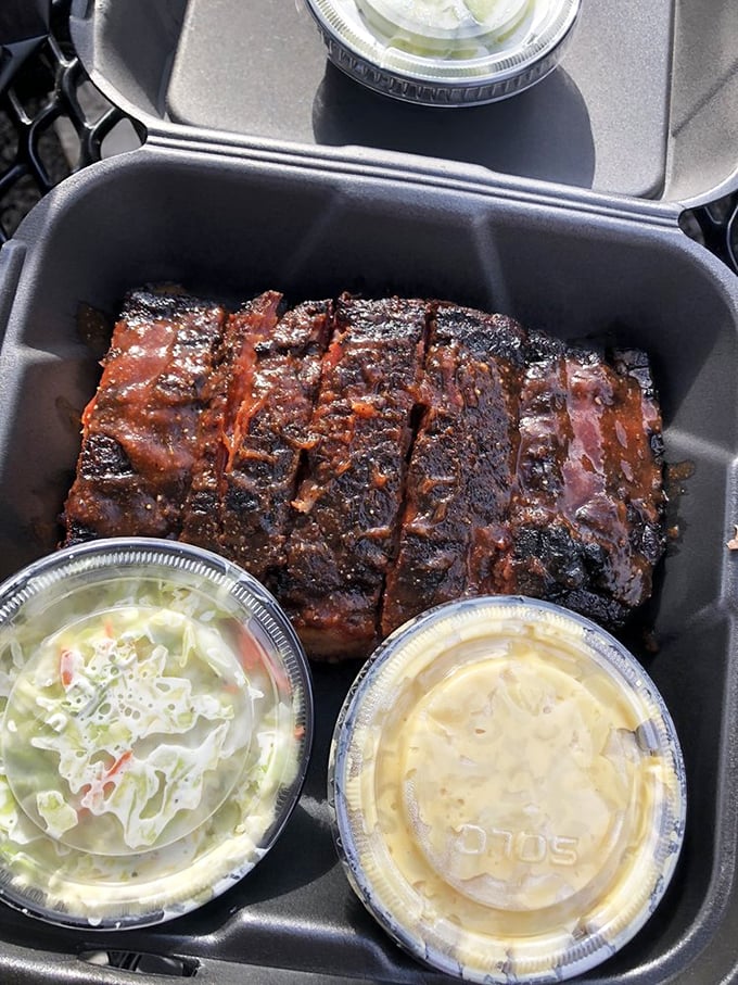 BBQ artistry at its finest—each rib a testament to patience and fire. That smoke ring is the barbecue equivalent of a Michelin star.