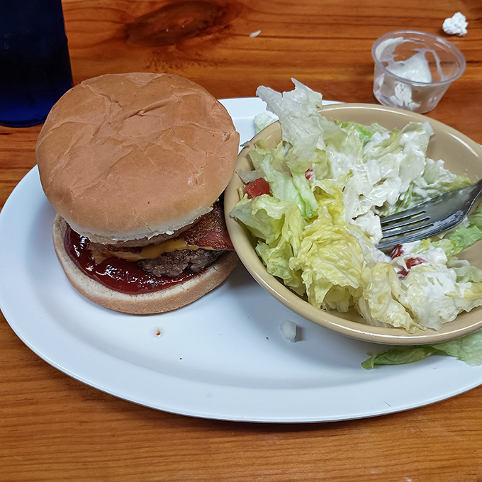 When a burger gets dressed up with bacon and cheese, it's not showing off—it's just living its best life.