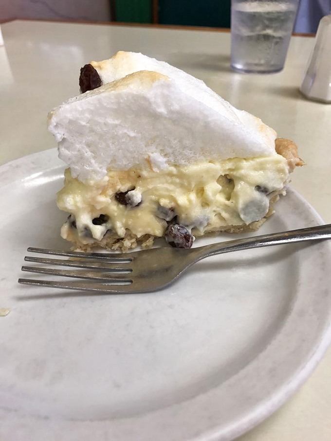 Towering meringue and creamy custard studded with plump raisins—this isn't just pie, it's an edible Kansas heirloom.