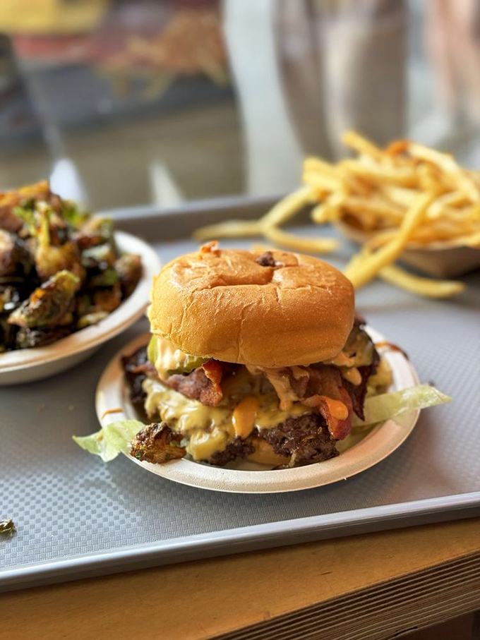 Behold the harmony of beef, cheese, pickles, and sauce—a culinary quartet that performs better together than the Beatles at their peak.
