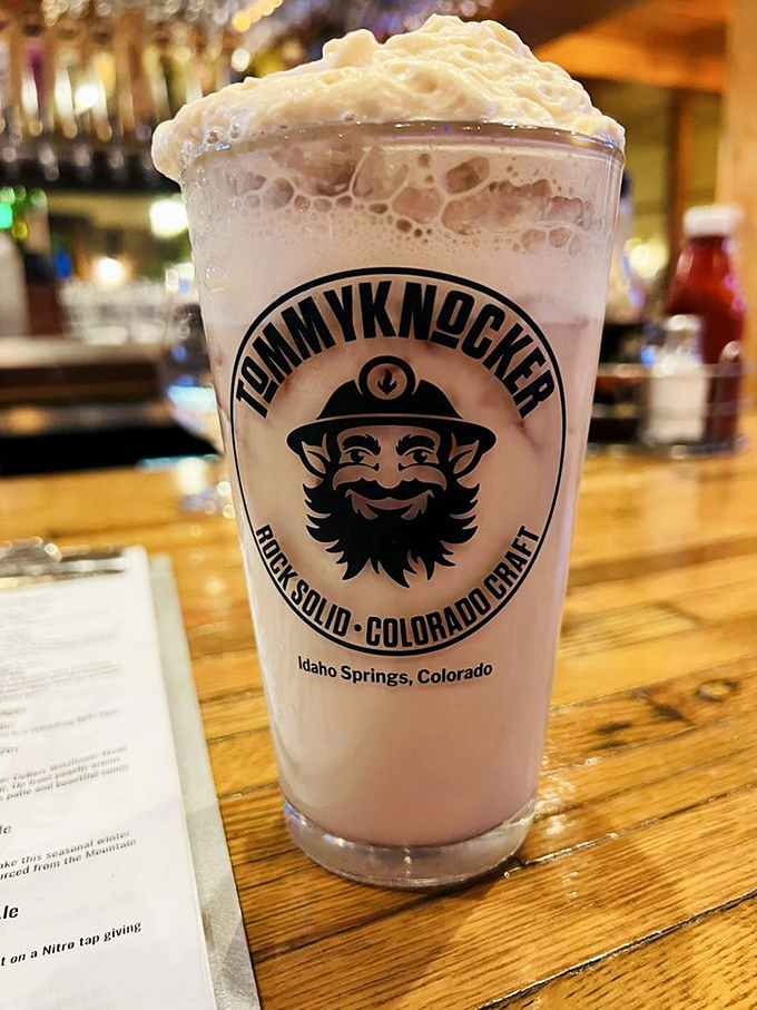 Their signature brew sports the mischievous tommyknocker logo. This isn't just a beer—it's liquid Colorado history with notes of mountain sunshine and pine.