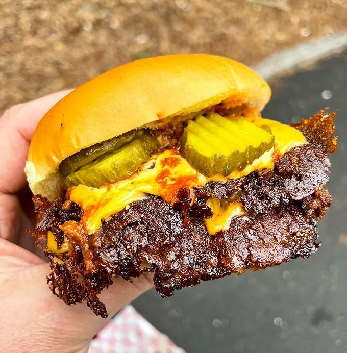 This isn't just a double cheeseburger—it's edible architecture with crispy-edged patties and melty cheese that makes your inner child high-five your adult self.