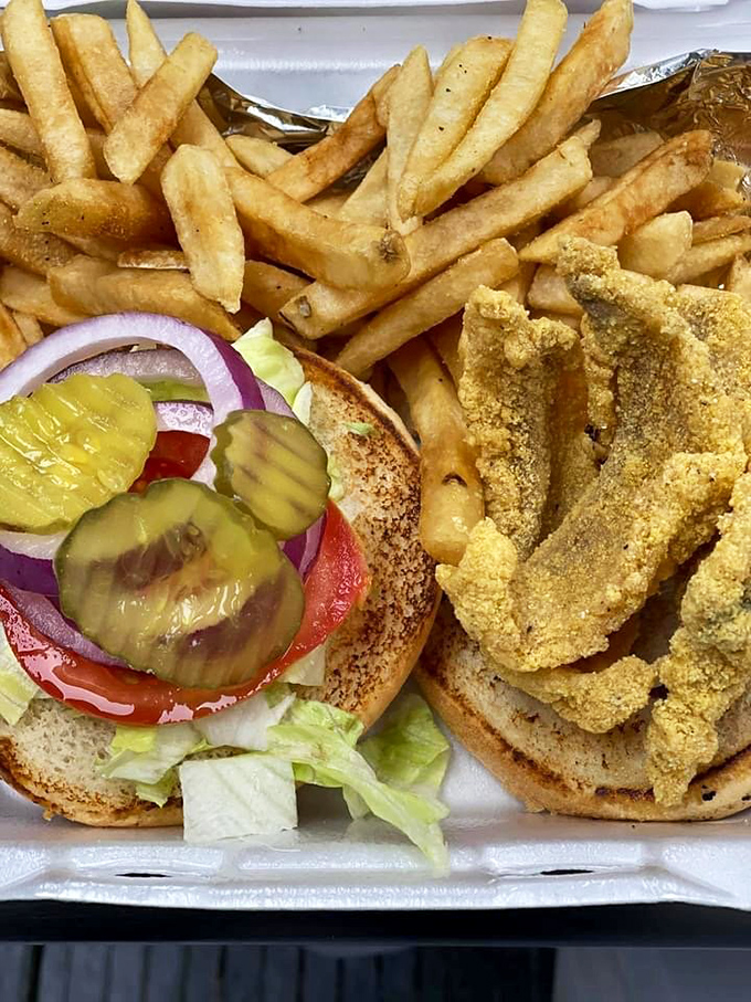 Southern comfort on a bun – golden cornmeal-crusted catfish with fresh veggies and fries that make fast food chains weep with inadequacy.