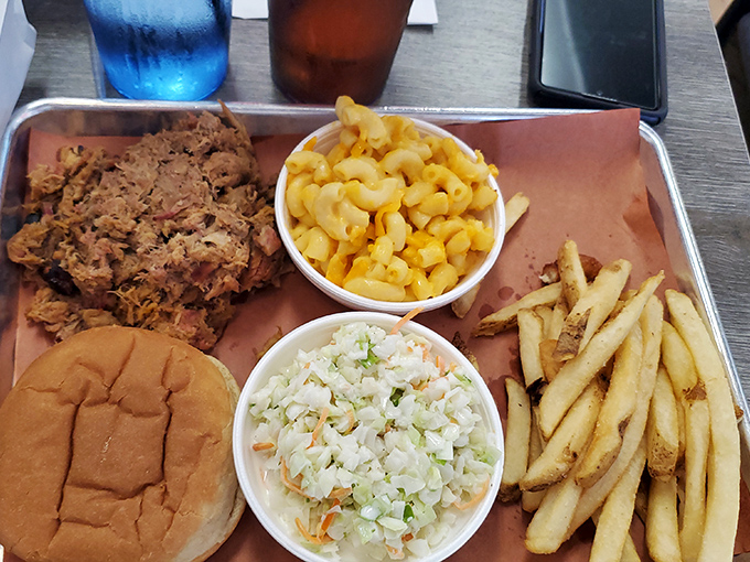 The holy trinity of comfort: pulled pork, mac and cheese, and coleslaw. Simple pleasures that somehow solve all of life's problems.