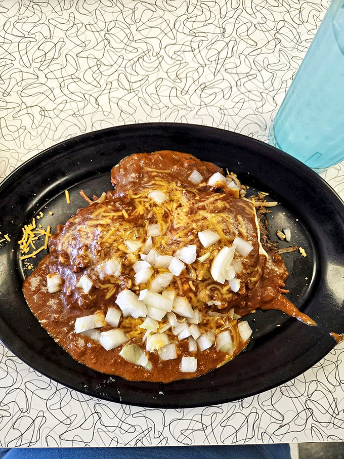 Meet the Slinger—St. Louis's answer to "what if we put everything delicious on one plate?" Eggs, hash browns, and chili creating breakfast magic.