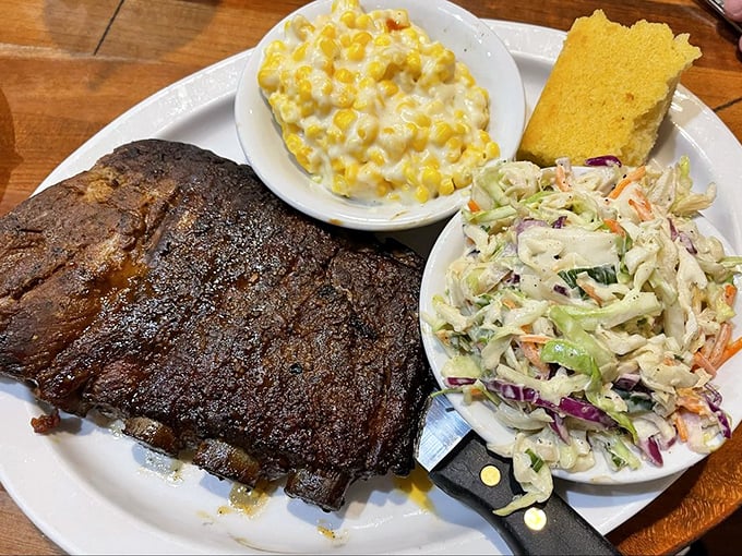 These St. Louis ribs look like they've been kissed by smoke angels—paired with creamy slaw and golden cornbread that's begging to sop up every last drop.